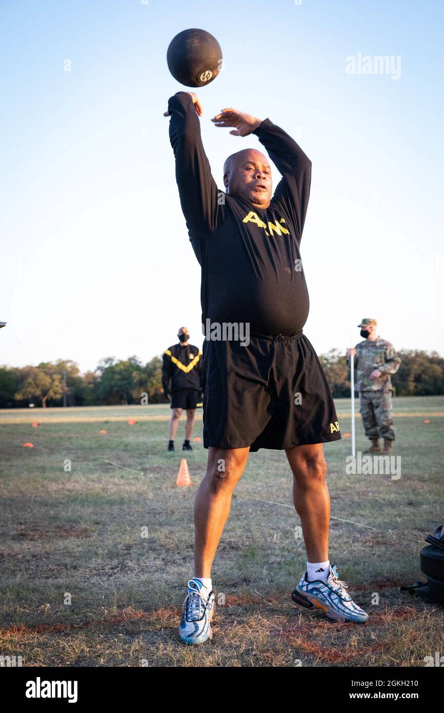 A U.S. Army Service Member conducts his first throw for the standing ...