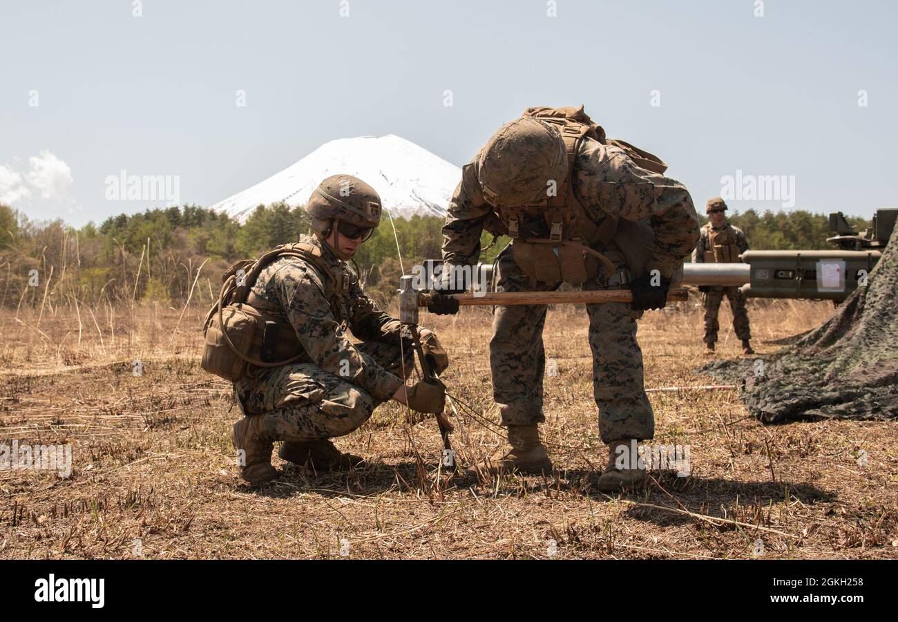 U.S. Marine Corps Lance Cpl. Andrew Long and Chris Barraza, both field ...