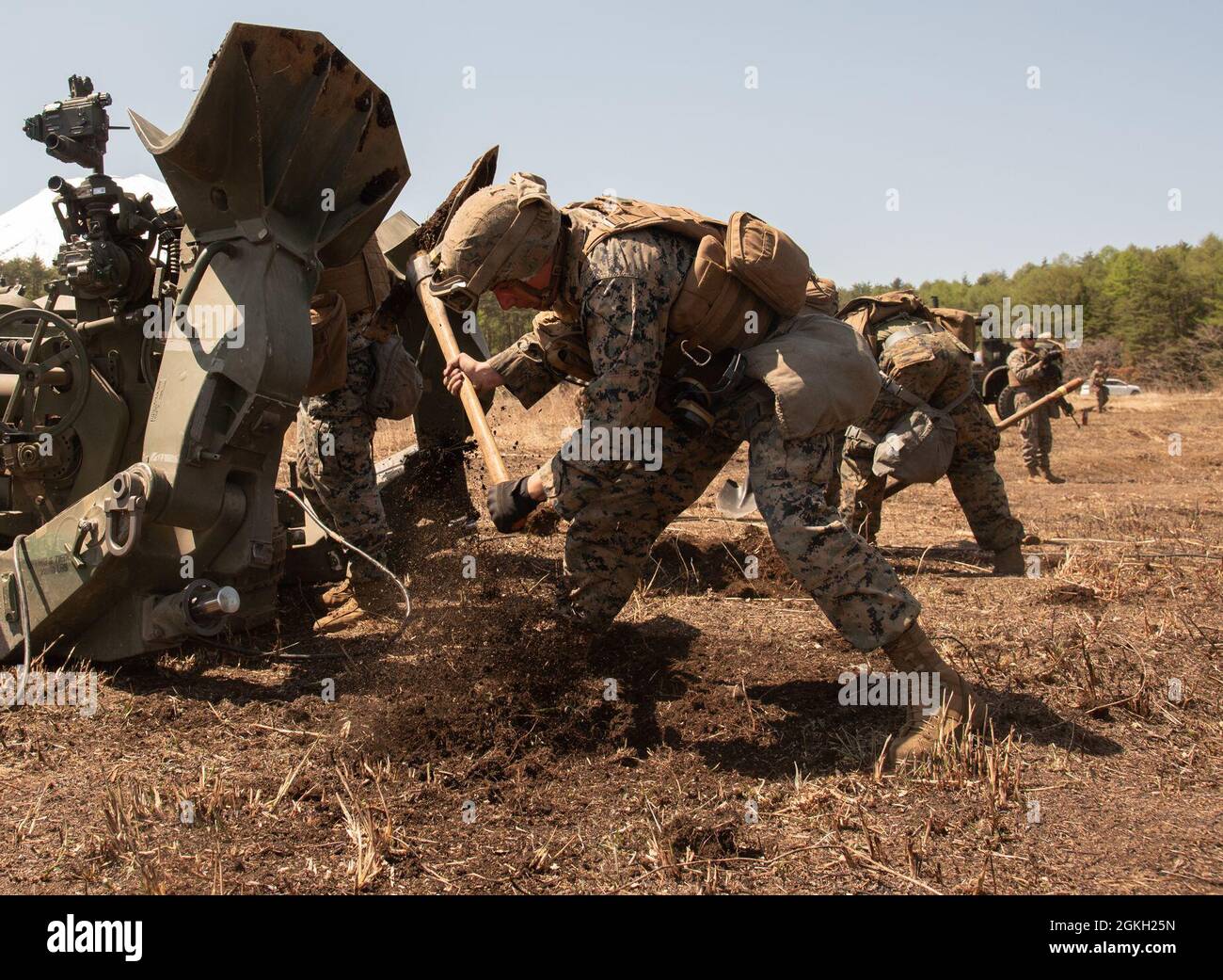 U.S. Marine Corps Cpl. Antonio Ricarte, a field artillery cannoneer ...