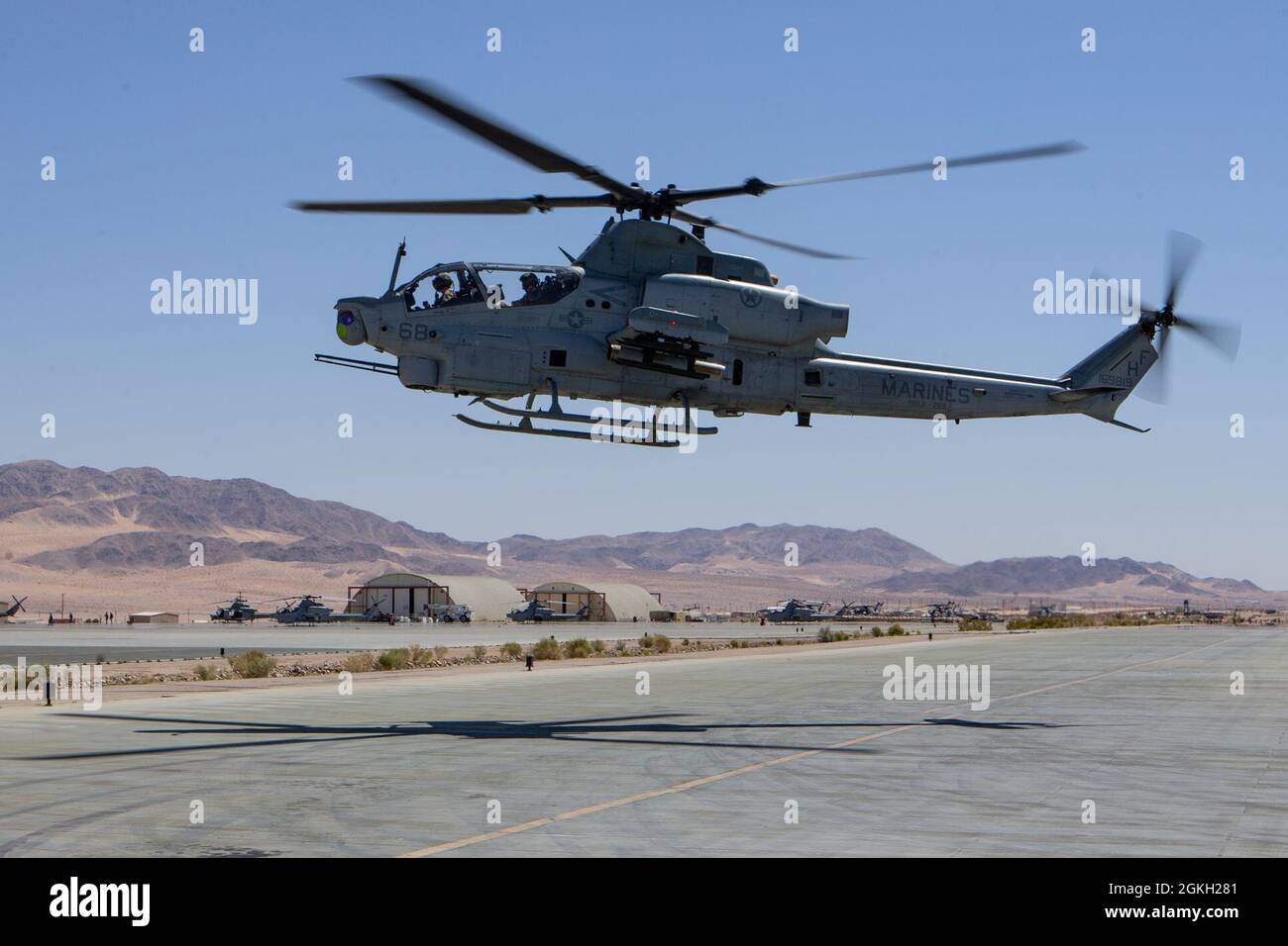 U.S. Marines with Marine Light Attack Squadron (HMLA) 269 take off in ...