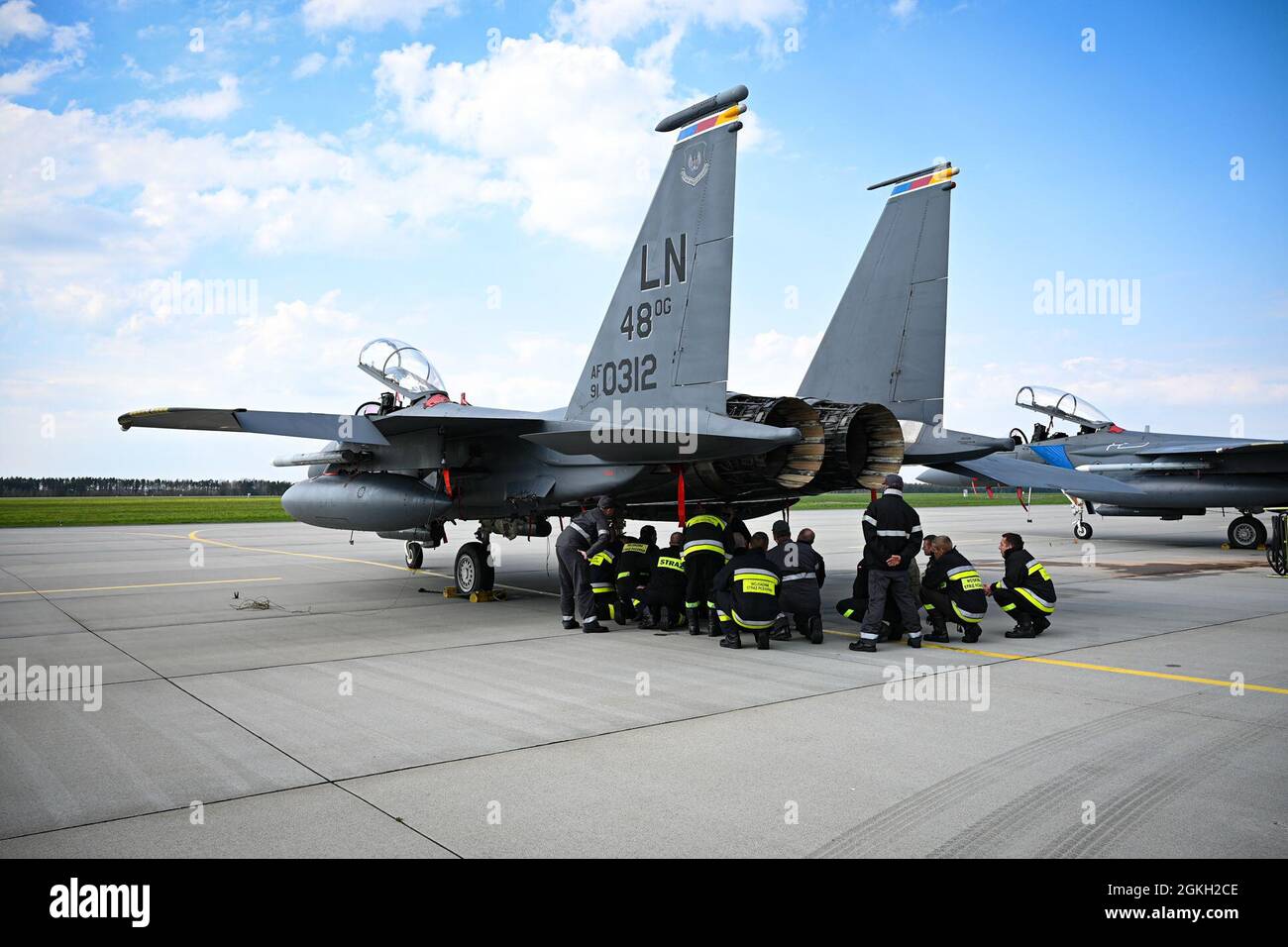 The Łask Air Base fire department receives training from Staff Sgt ...