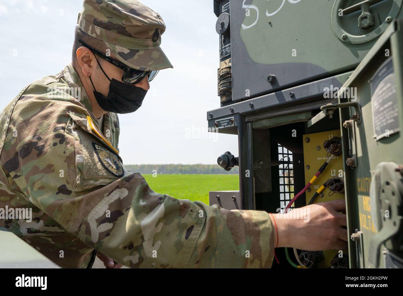 U.S. Army Staff Sgt. Christian Cuesta, a multichannel transmission ...