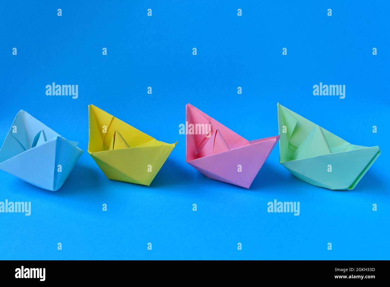 Origami color paper boats hi-res stock photography and images - Alamy