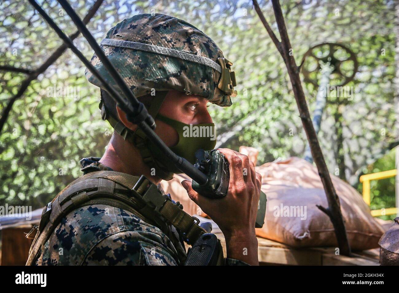 U.S. Marine Corps Lance Cpl. Stephen Via, heavy equipment operator with ...