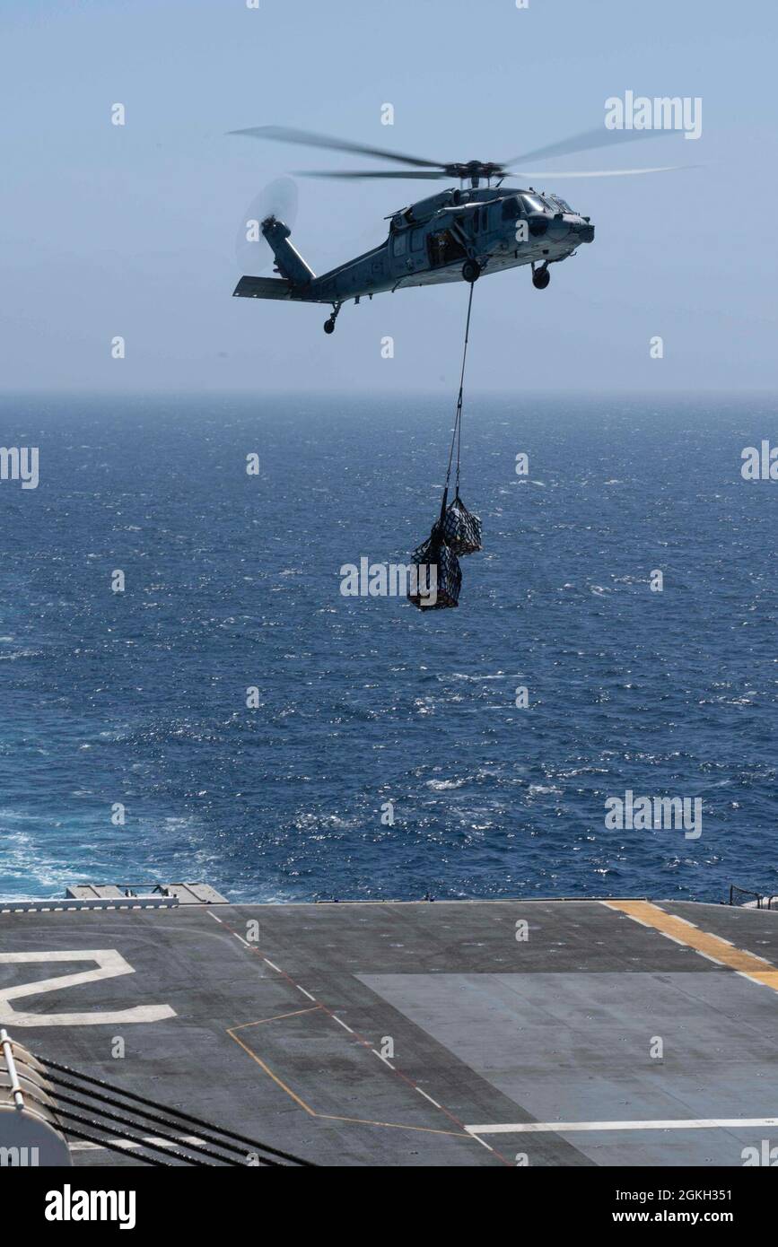 PACIFIC OCEAN (April 19, 2021) A MH-60S Sea Hawk, assigned to ...