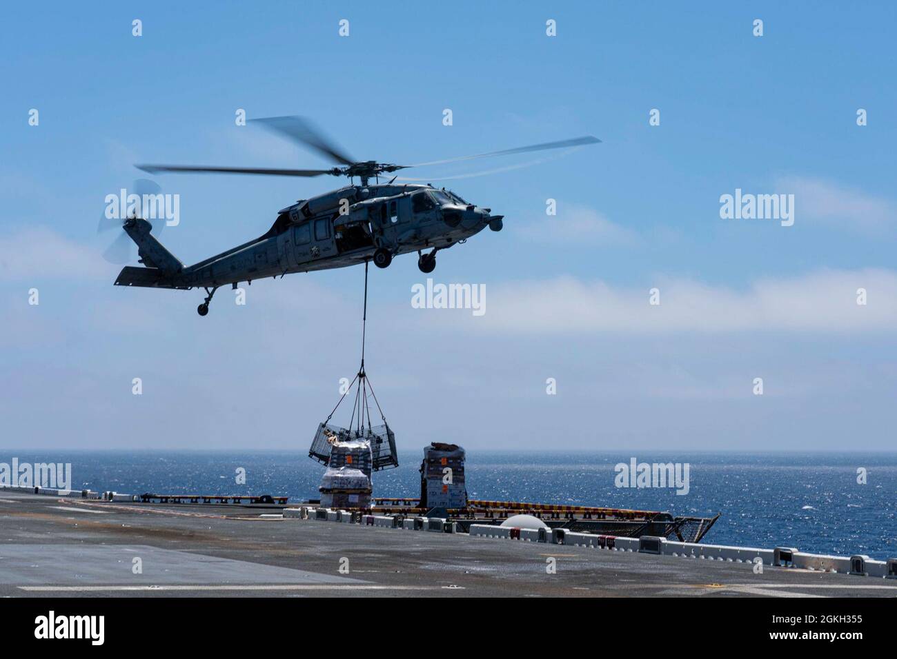 PACIFIC OCEAN (April 19, 2021) A MH-60S Sea Hawk, assigned to ...