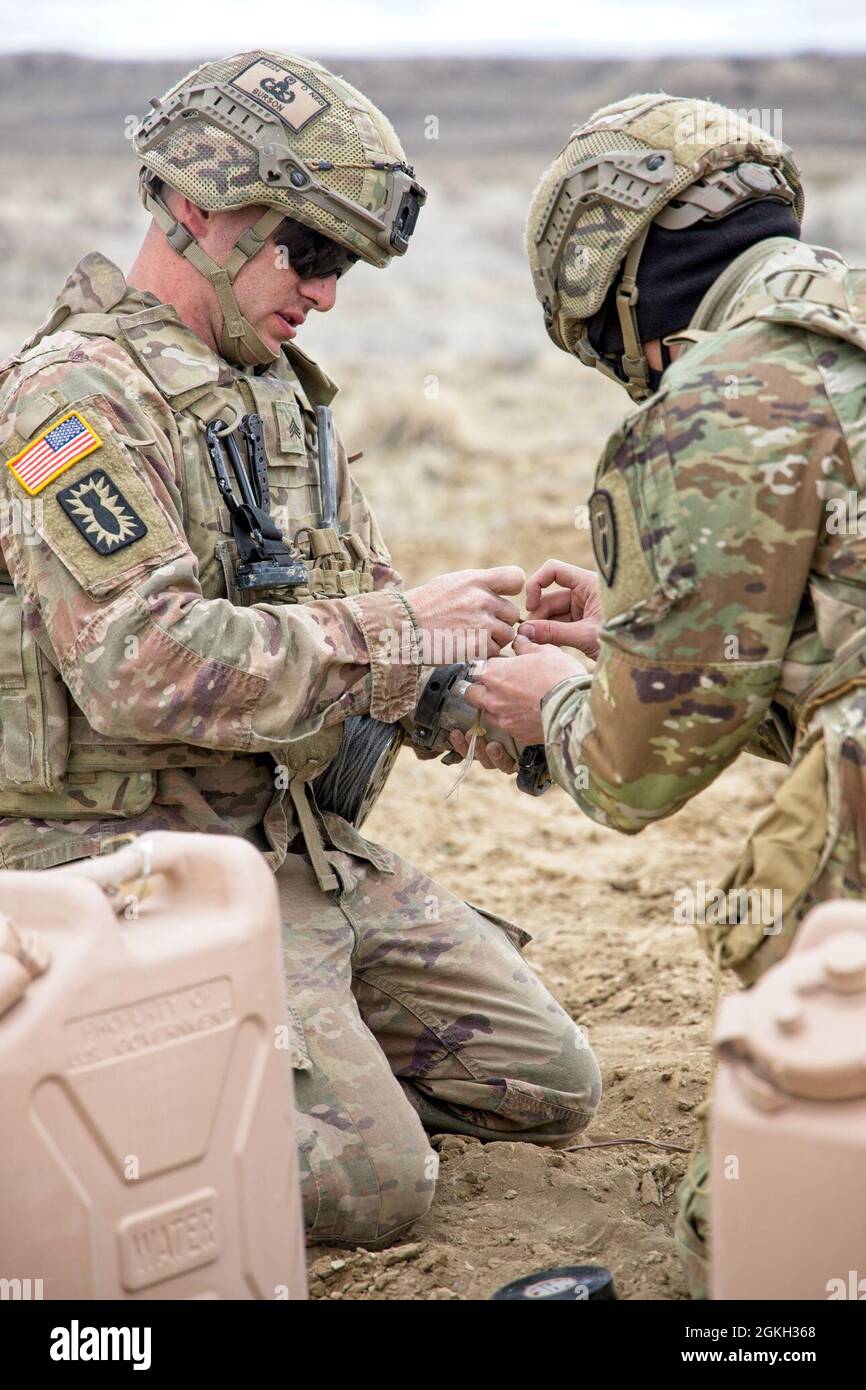 Sgt. Phillip Burson 79th EOD Bn., 752nd EOD Company and his teammate ...