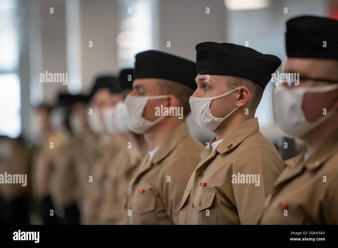 Recruits stand at attention during a phase 3 personnel inspection ...