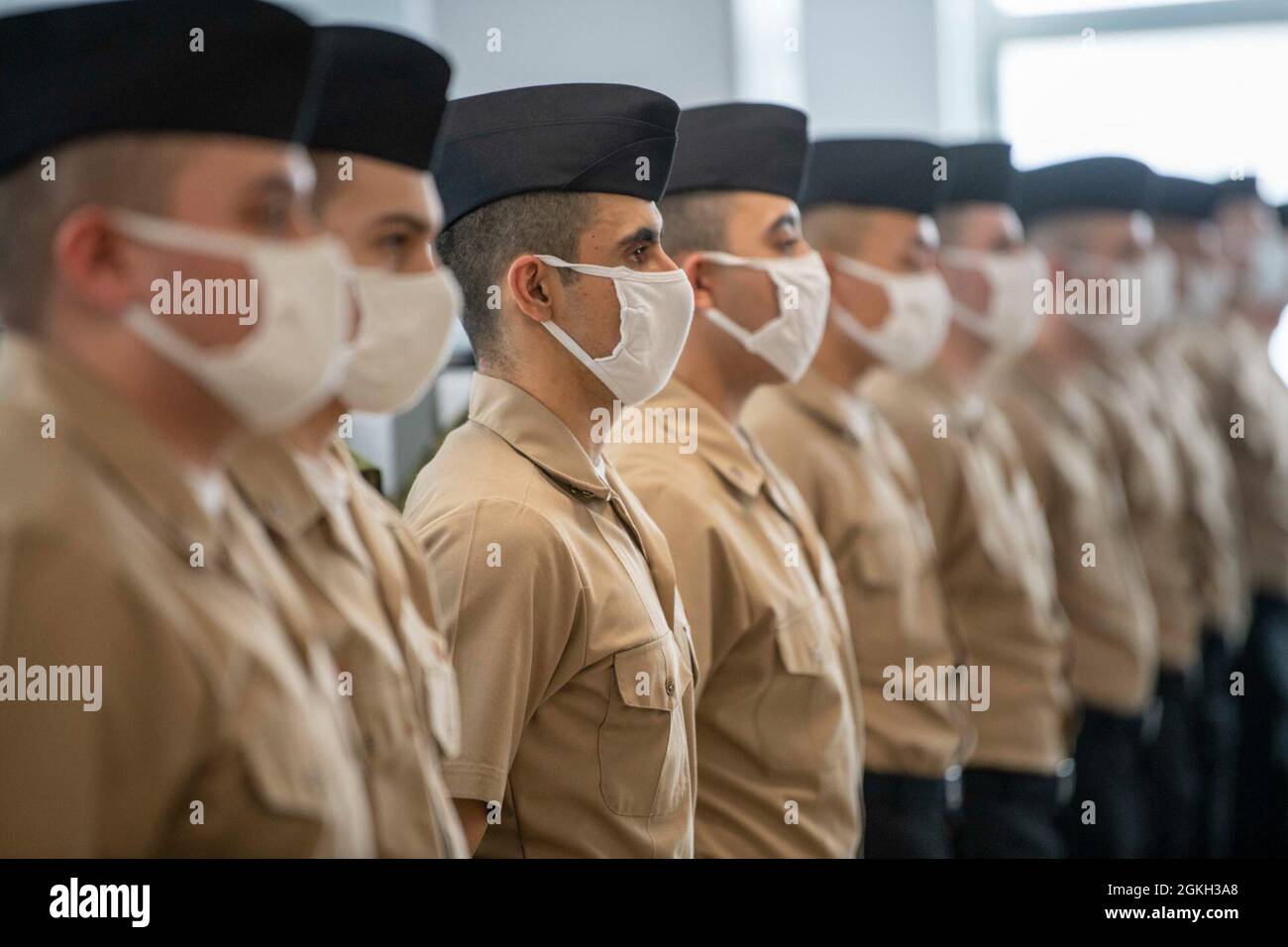 Recruits stand at attention during a phase 3 personnel inspection ...