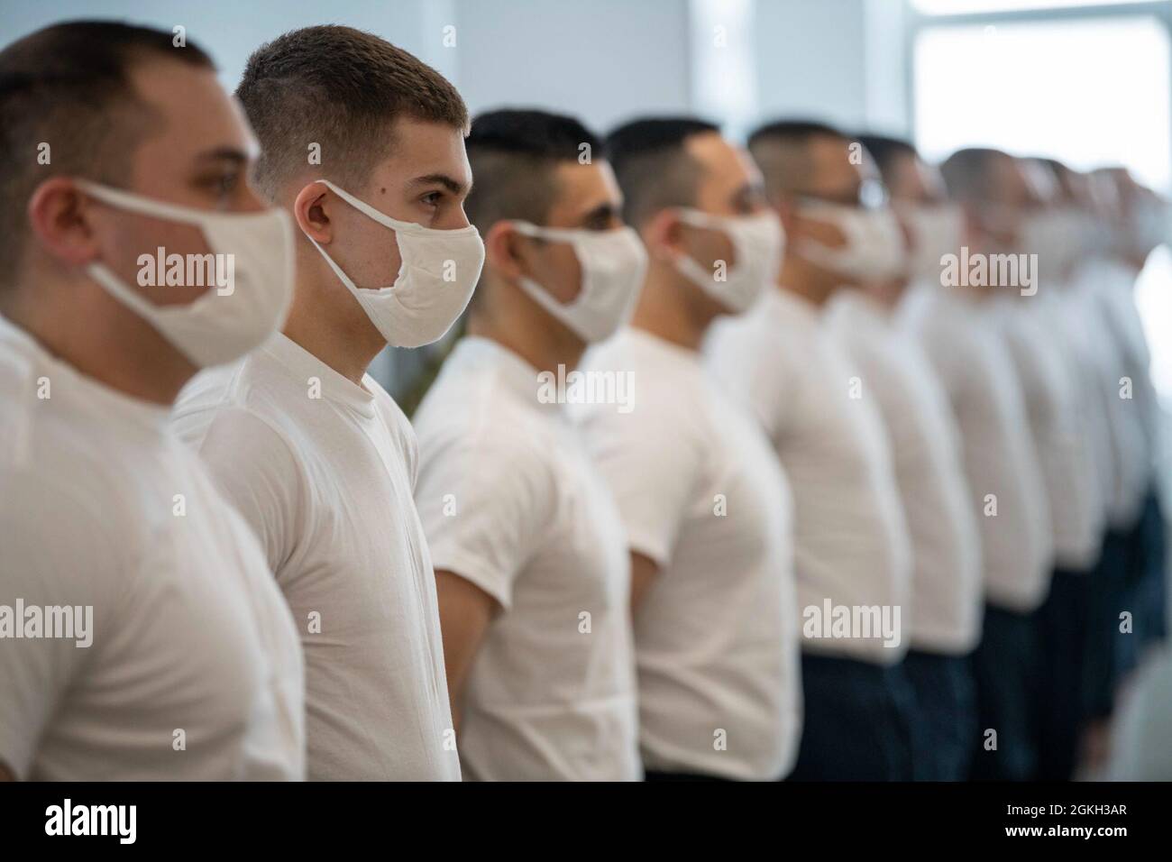 Recruits stand at attention before a phase 3 personnel inspection ...