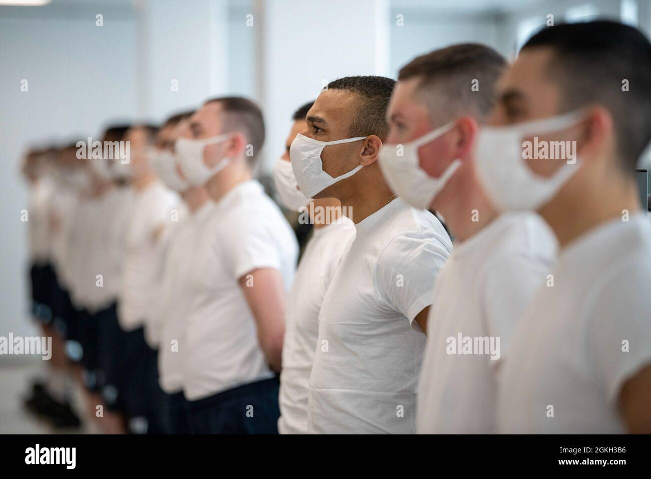 Recruits stand at attention before a phase 3 personnel inspection ...