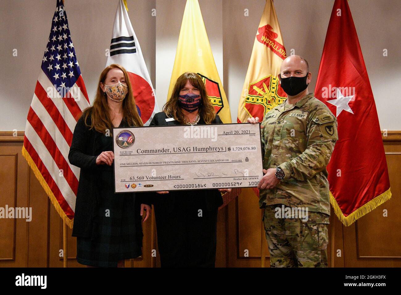 CAMP HUMPHREYS, Republic of Korea - Ms. Heather Ray, left, the director ...