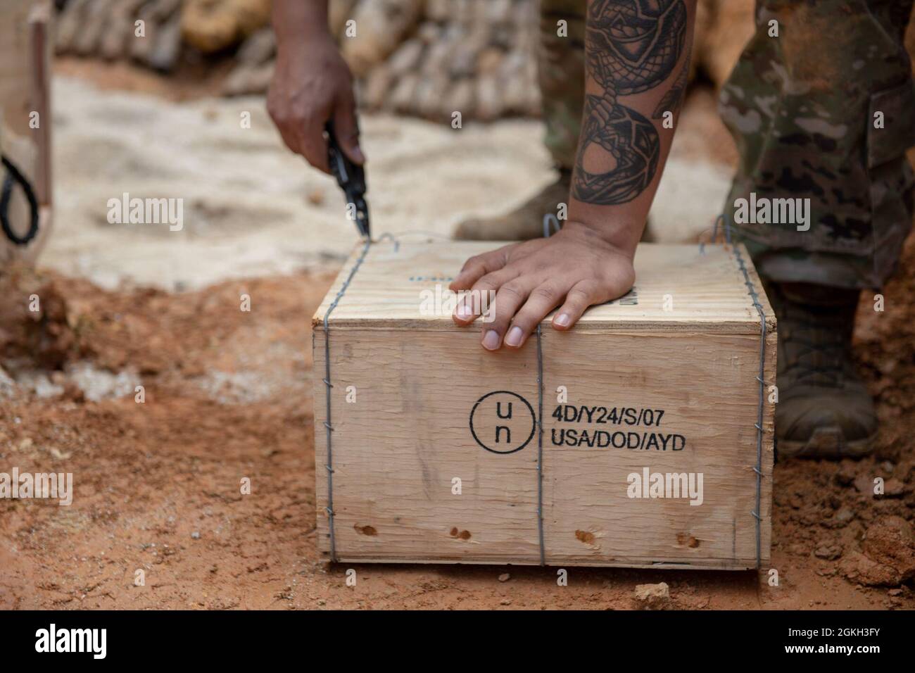 A member of the 18th Civil Engineer Squadron Explosive Ordnance ...