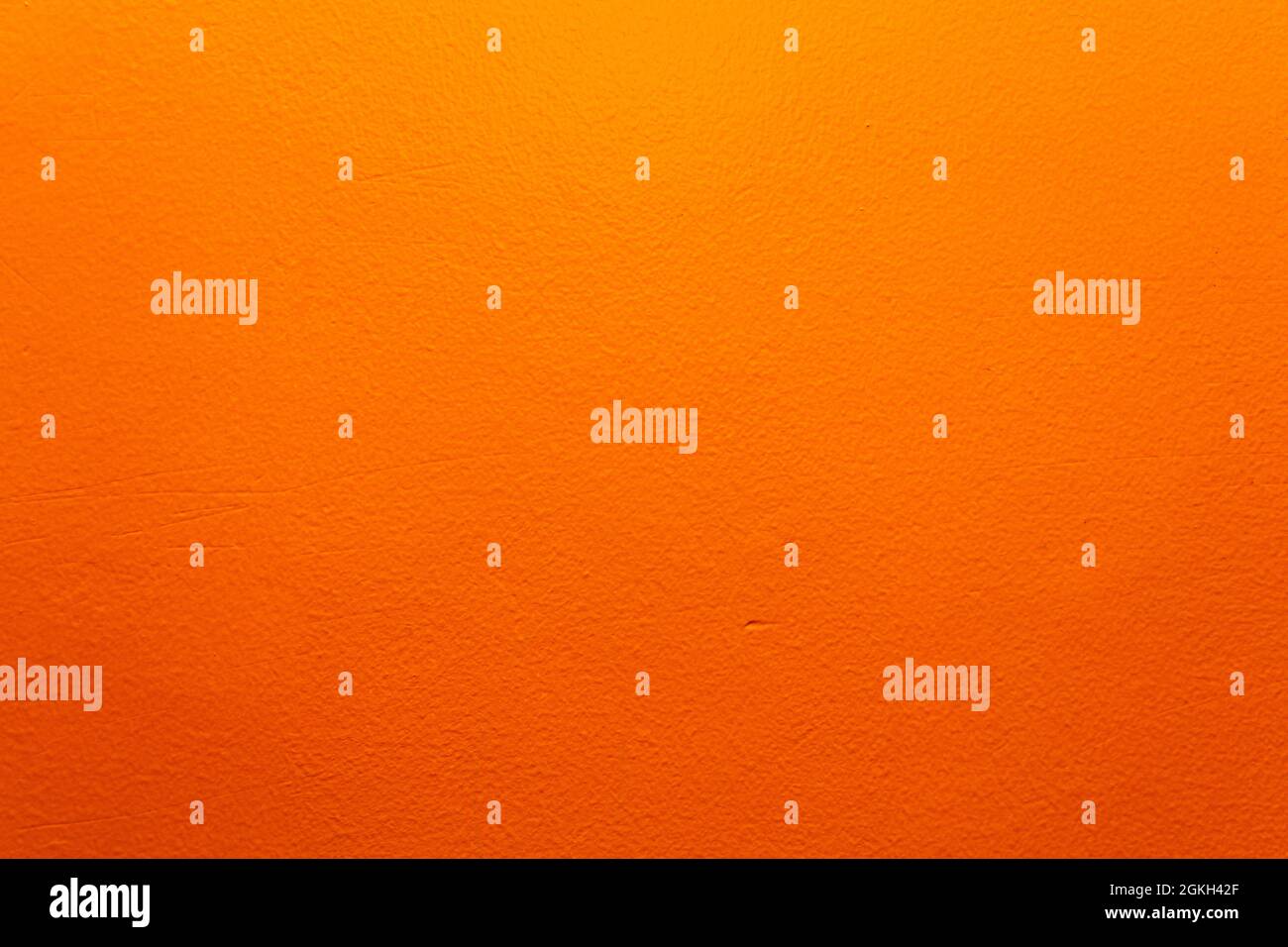 wall painted with solid orange color Stock Photo - Alamy
