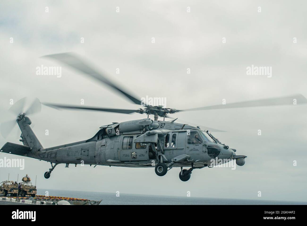 PACIFIC OCEAN (April 20, 2021) A U.S. Navy MH-60S Sea Hawk assigned to ...