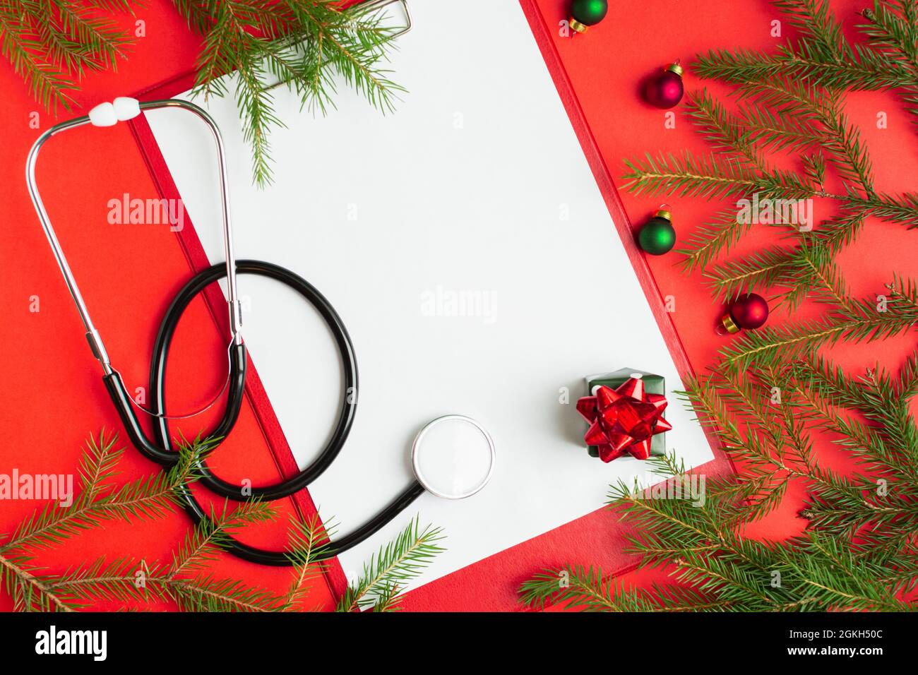 Medical Christmas concept with stethoscope, blank clipboard with white ...