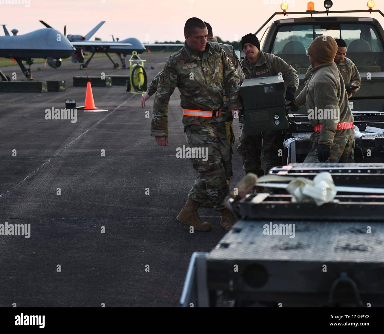 Members of the 147th Attack Wing Aircraft Maintenance Sqaudron prepare ...