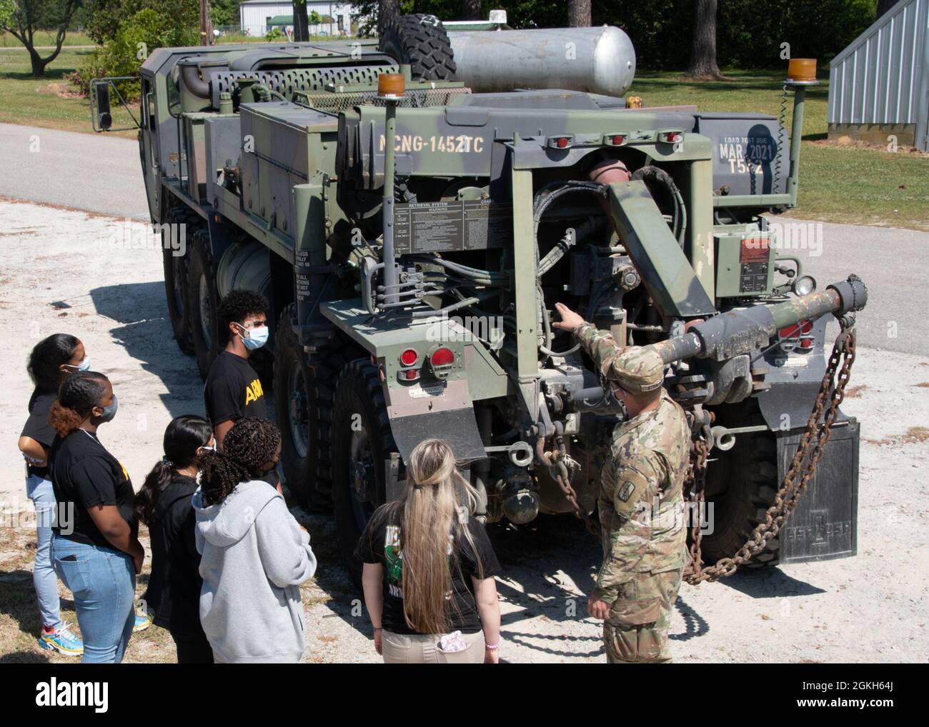 Spc. John Strader, a wheeled vehicle mechanic assigned to the 1452nd ...