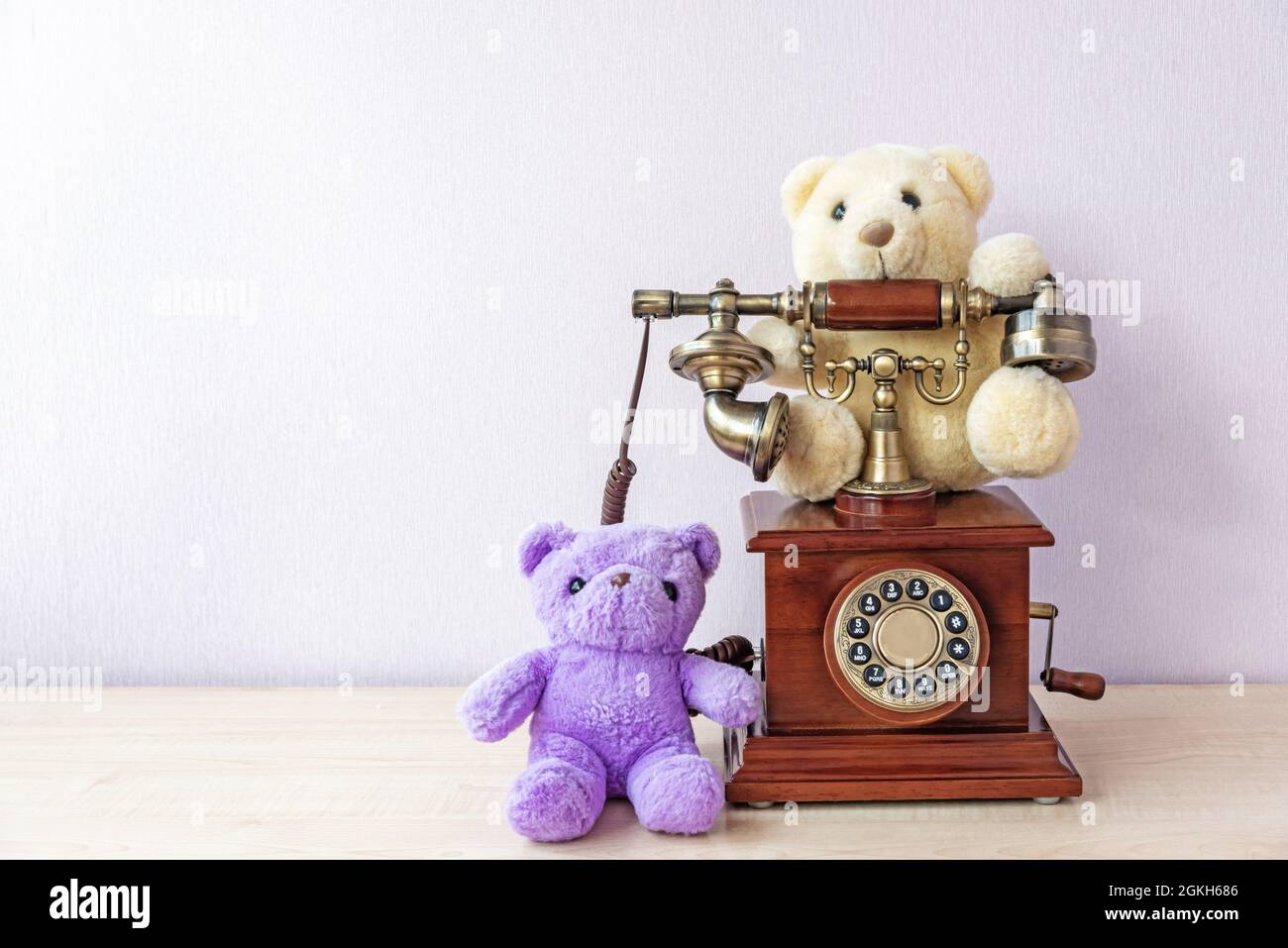 Small teddy bears around stylish vintage telephone on table Stock Photo ...