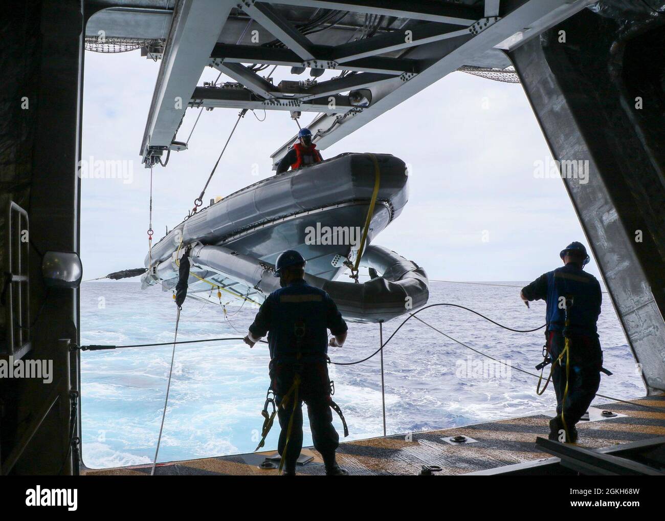 PACIFIC OCEAN (April 21, 2021) Sailors prepare to launch an 11-meter ...