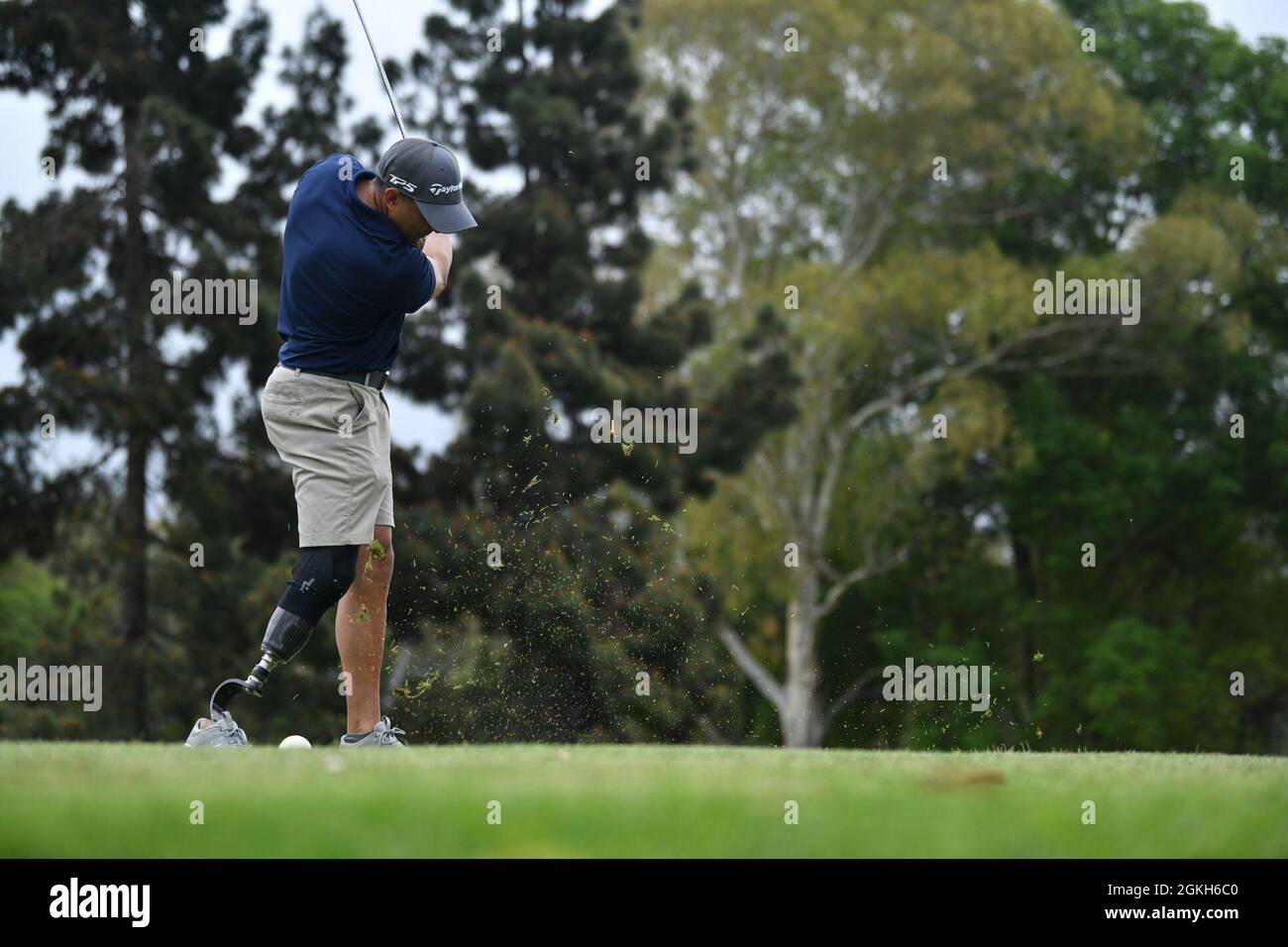 U.S. Marine Corps Capt. Thomas Benge competes in the golf finals during ...