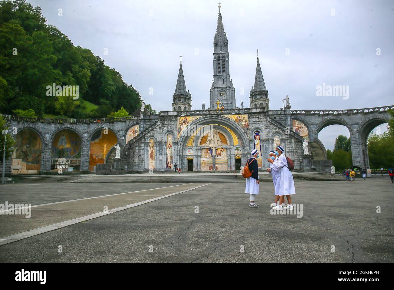 France, Lourdes, 2021-07-28. Few people in the middle of the day on the ...