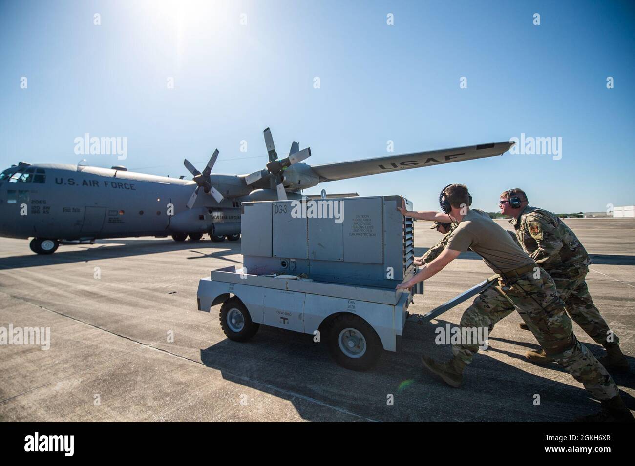 Members of the 120th Airlift Wing, Montana Air National Guard, move ...