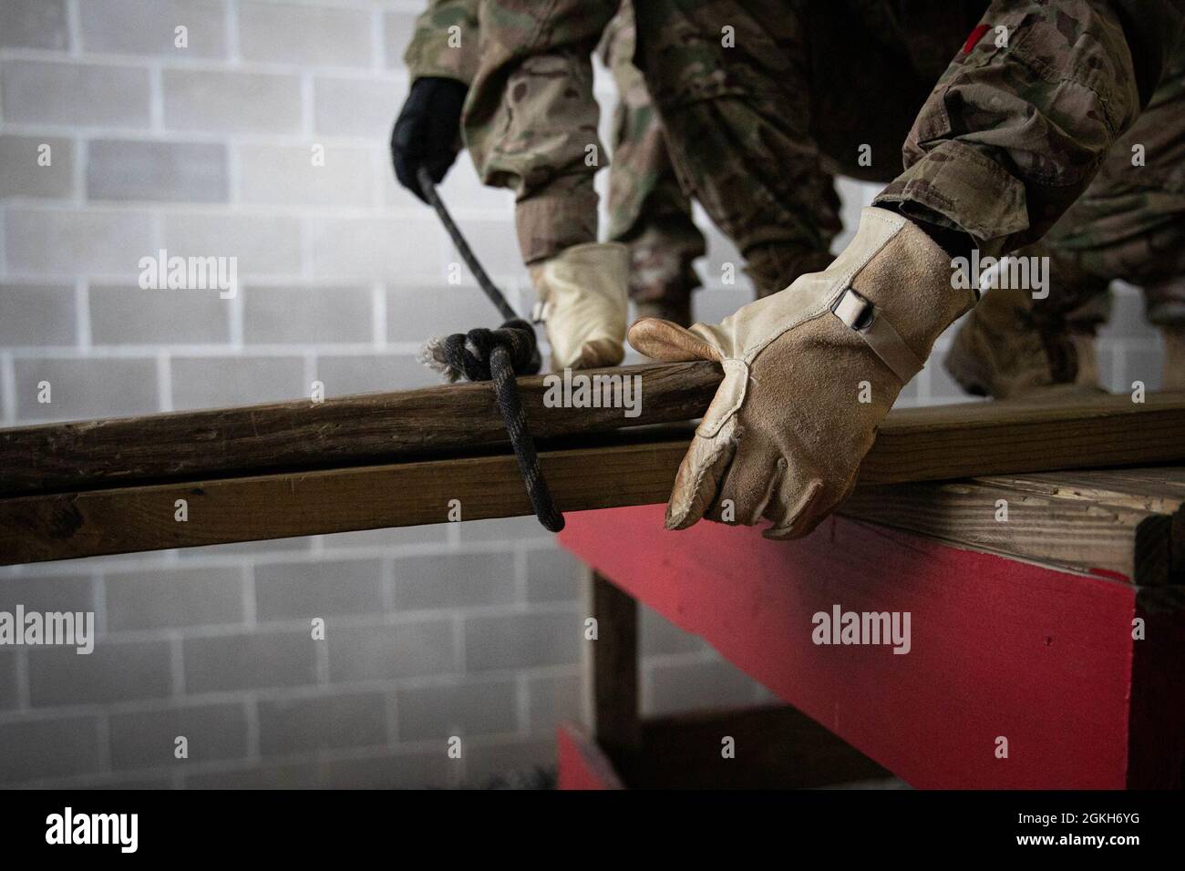A U.S. Army Soldier with the Army Reserve Sustainment Command, holds a ...