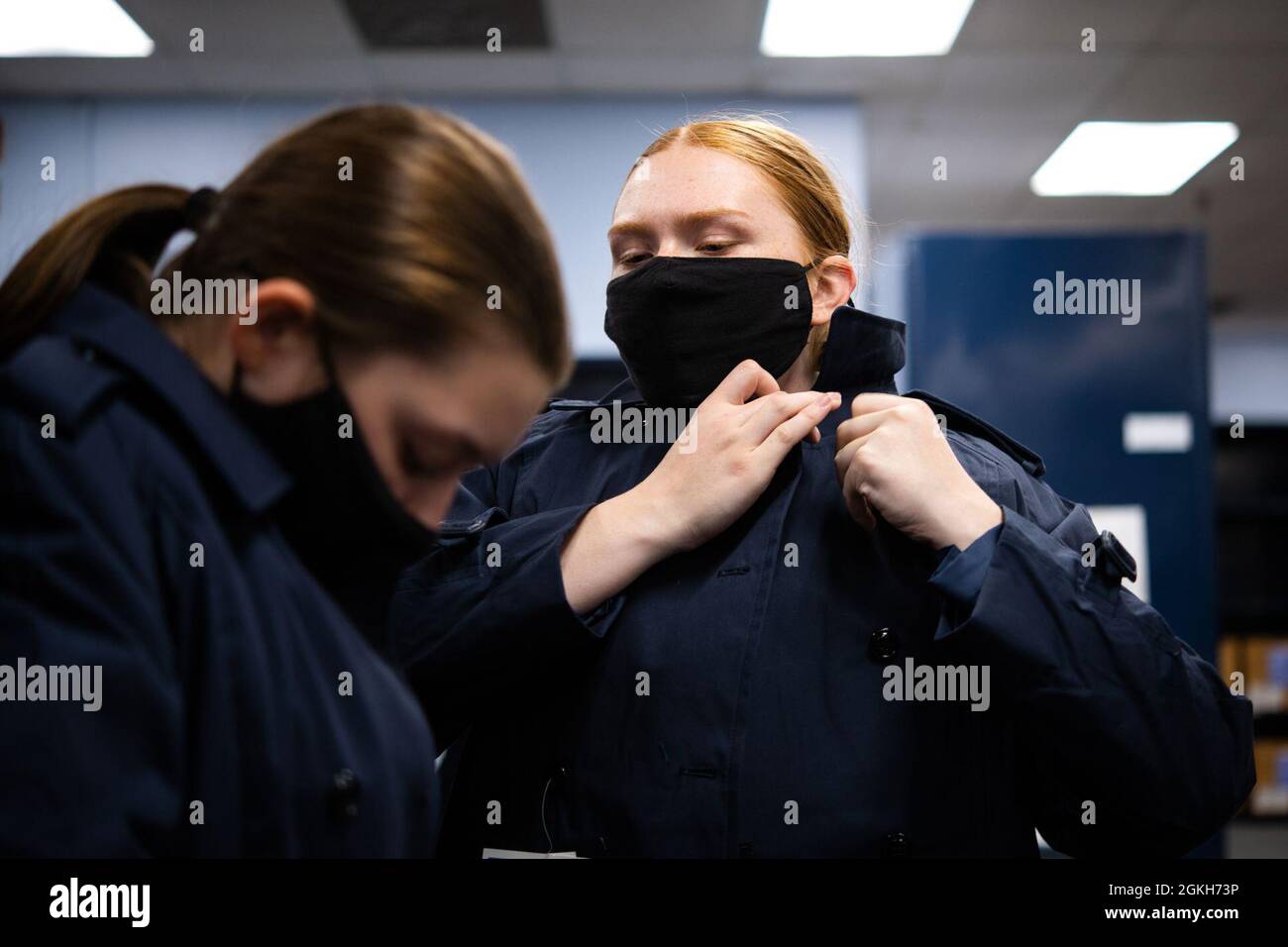 U.S. Air Force basic military training trainees receive their initial ...
