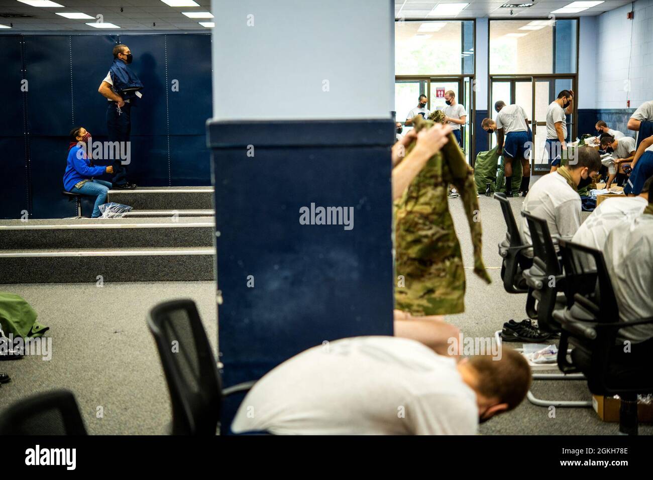 U.S. Air Force basic military training trainees receive their initial ...