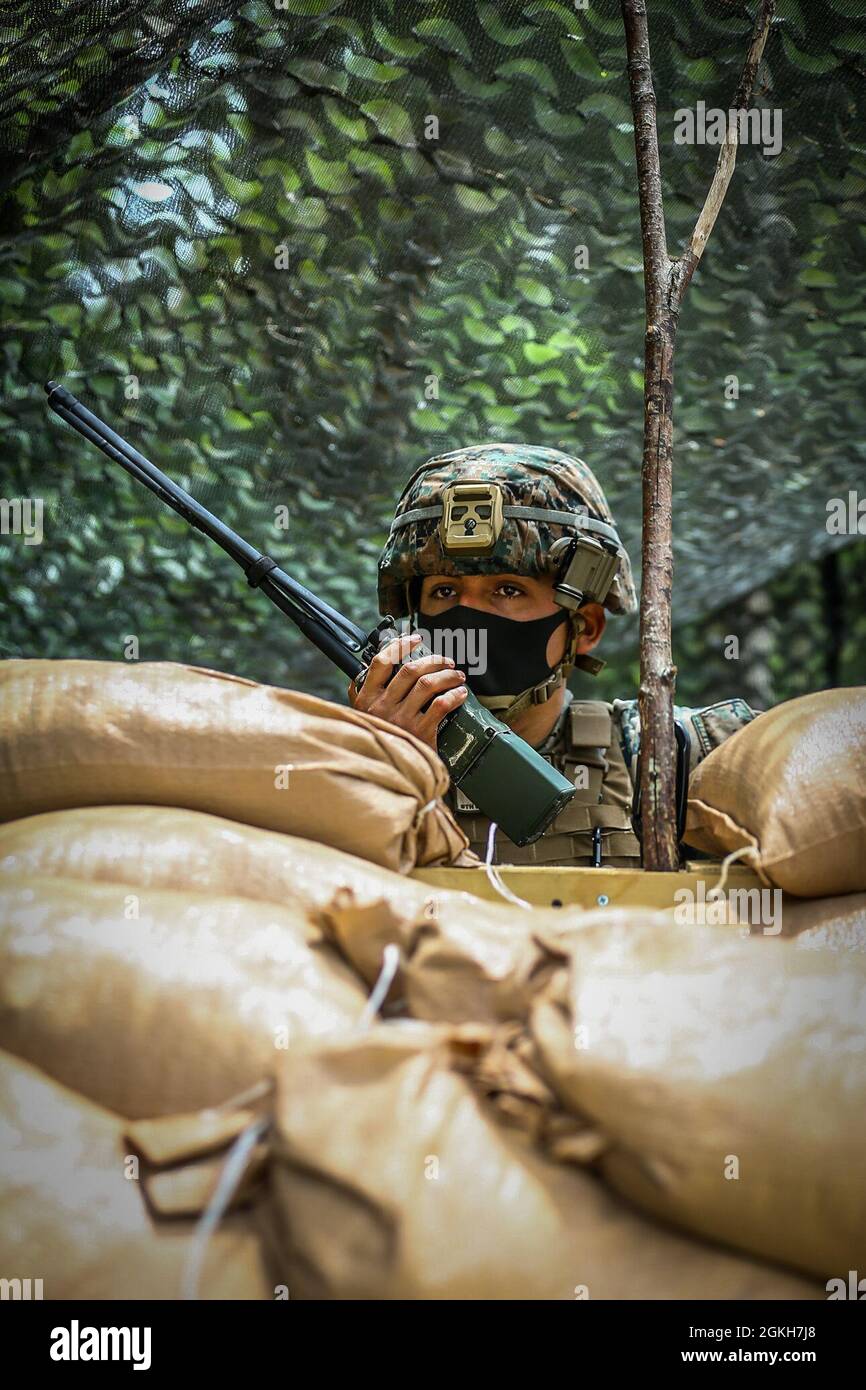 A U.S. Marine with Guard Force, 9th Engineer Support Battalion, 3d ...