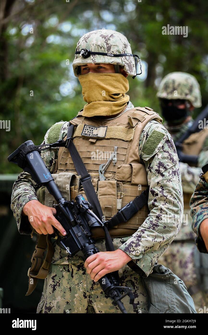 U.S. Navy Sailor UTCN Jesse Zimmer, utilitiesman with Naval Mobile ...