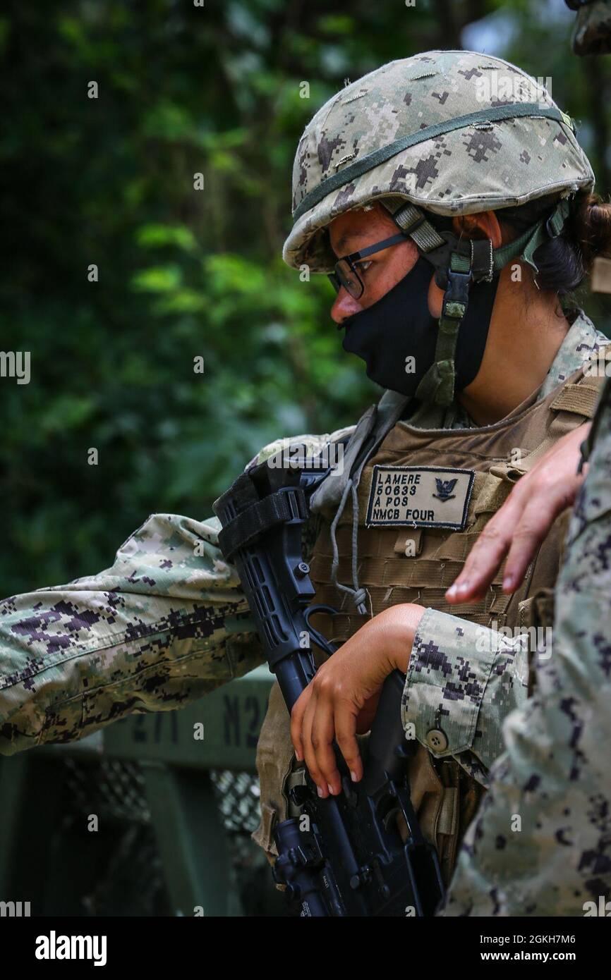 U.S. Navy Sailor UT3 Kristen Lamere, utilitiesman with Naval Mobile ...