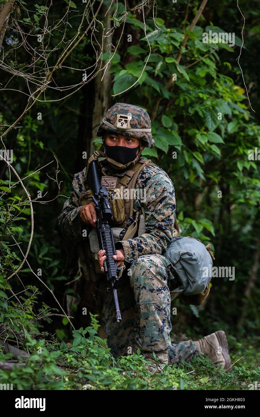 A U.S. Marine with 9th Engineer Support Battalion, 3d Marine Logistics ...