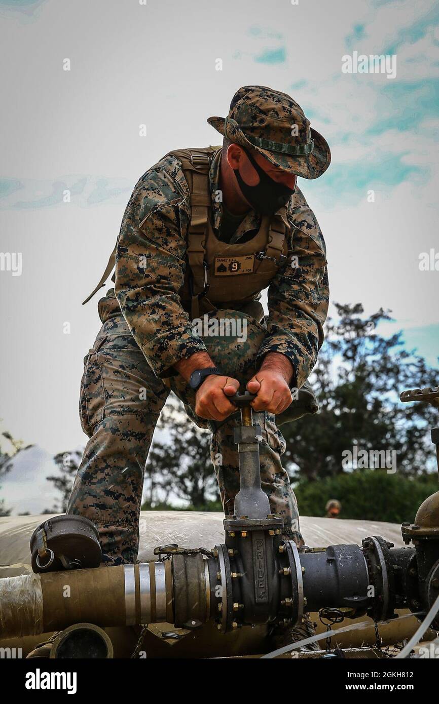 U.S. Marine Corps Sgt. Arthur Carney, water support technician with 9th ...