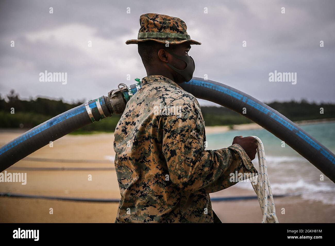 U.S. Marine Corps Cpl. Alex Wilson, water support technician with 9th ...
