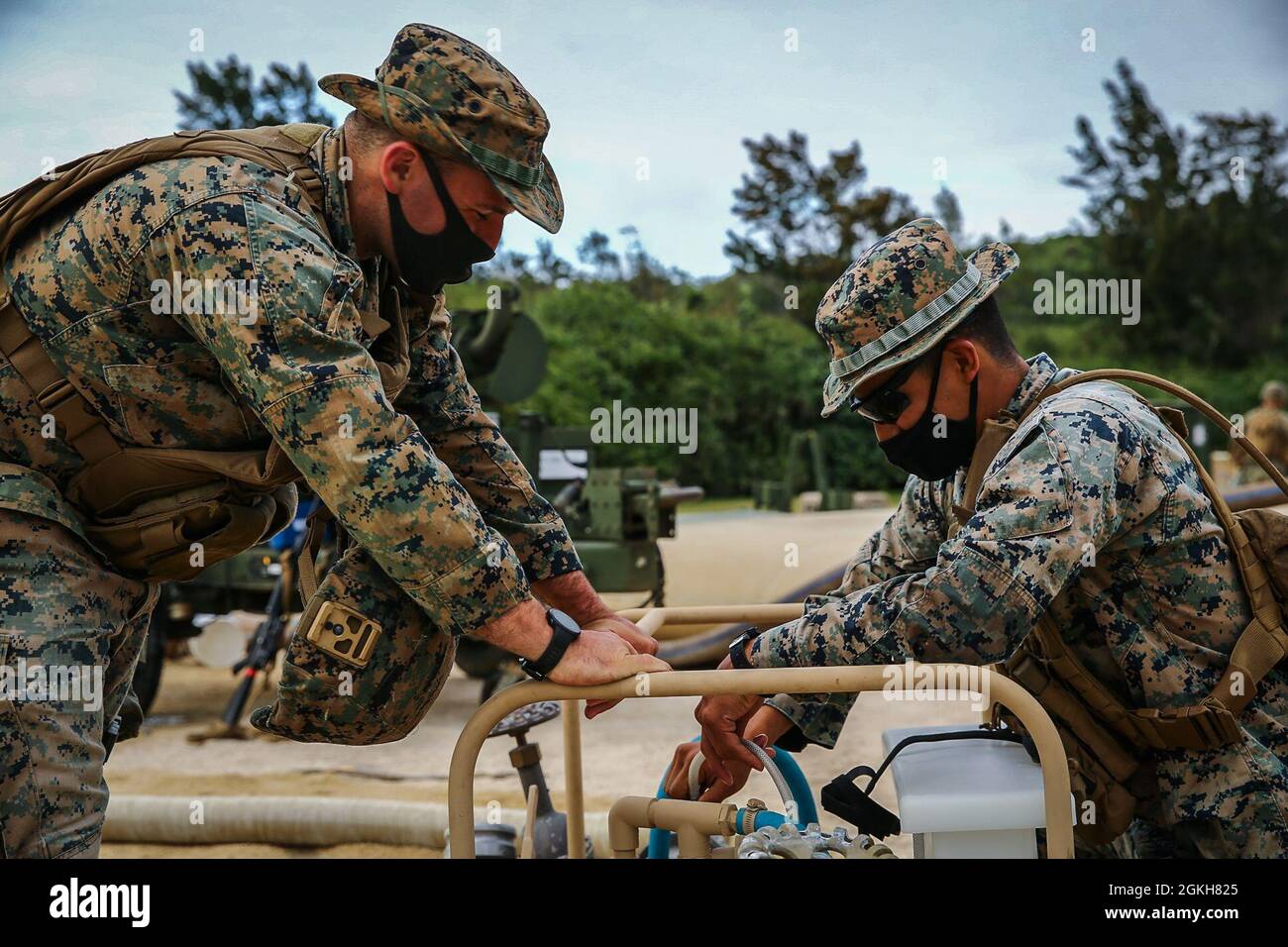 U.S. Marine Corps Sgt. Arthur Carney, left, and Cpl. Kevin Galaz, both ...
