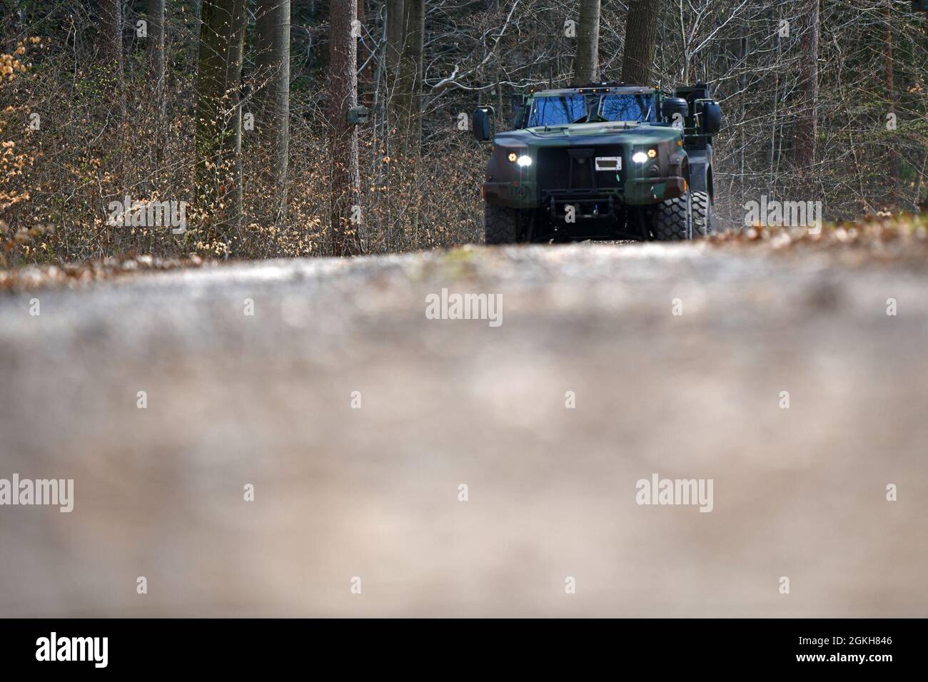 A Joint Light Tactical Vehicle (JLTV) prepares to enter the driver's ...