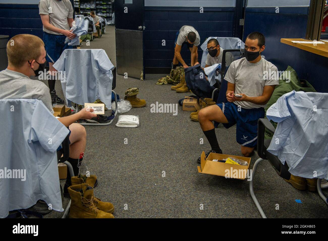 U.S. Air Force basic military training trainees receive their initial ...