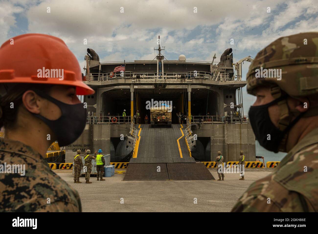 A U.S. Marine with III Marine Expeditionary Force and a U.S. Army ...