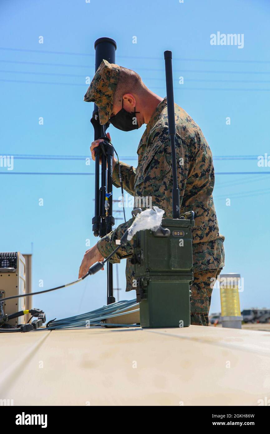 U.S. Marine Lance Cpl. Adam Clifford, a radio operator assigned to I ...