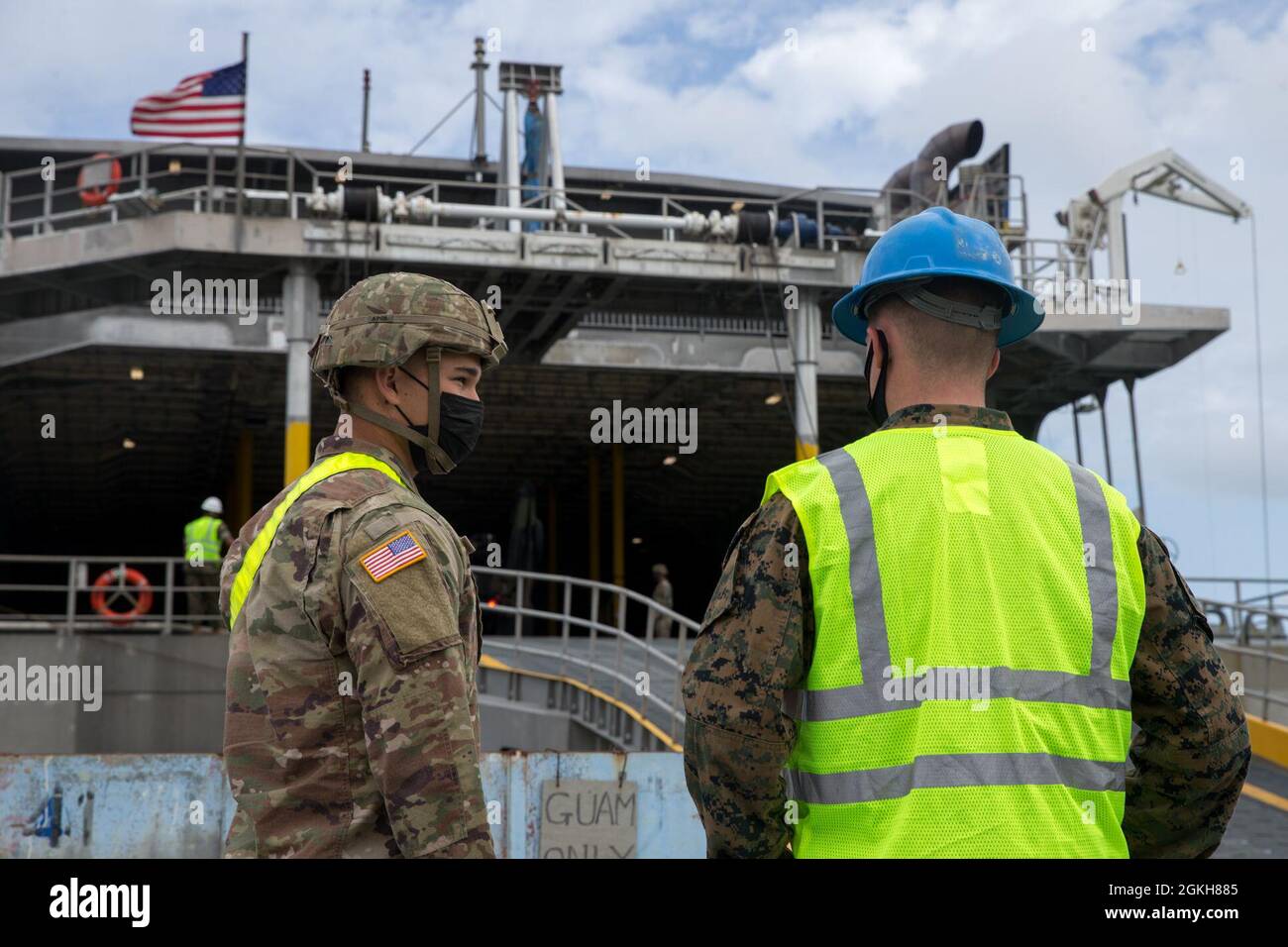 A U.S. Marine with III Marine Expeditionary Force and a U.S. Army ...