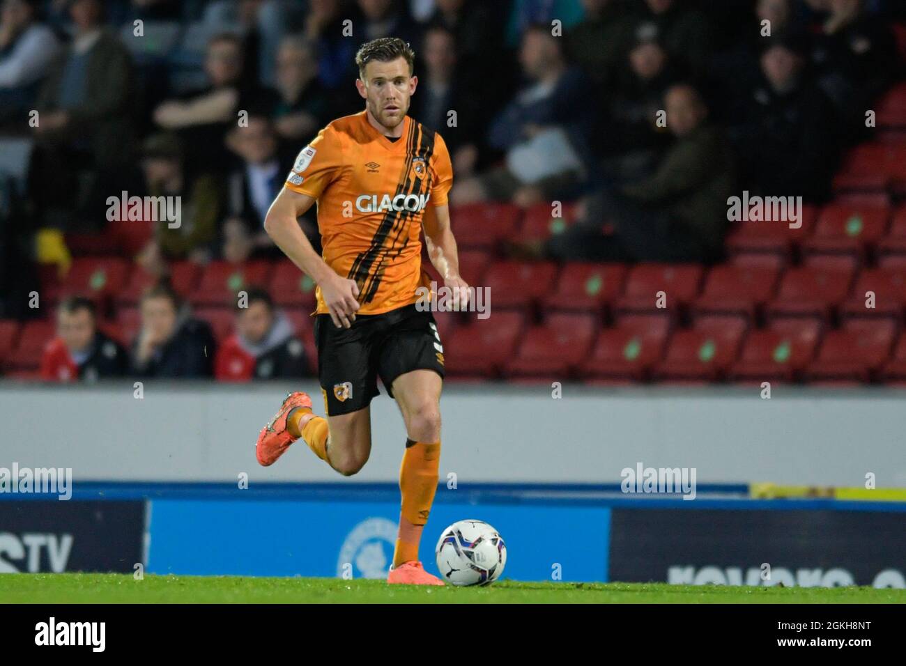 Blackburn, UK. 14th Sep, 2021. Callum Elder #3 of Hull City runs down ...