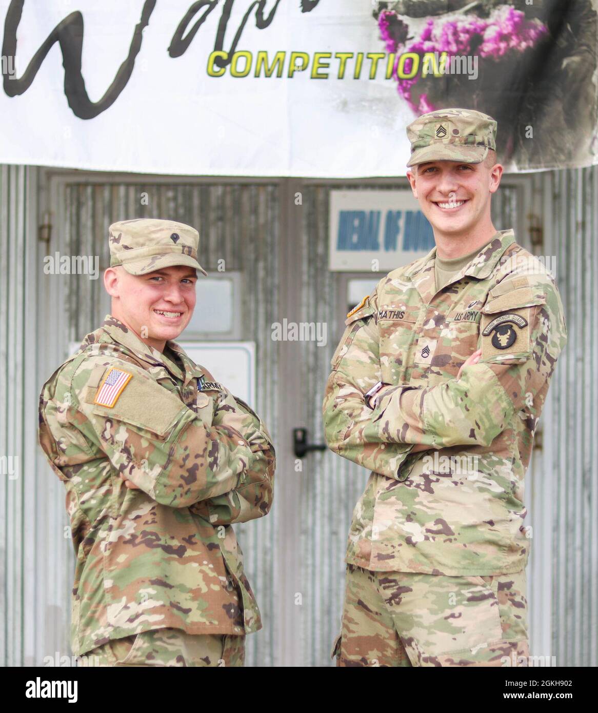 Spc. Brandon Cline and Staff Sgt. Tyler Mathis, with Headquarters ...