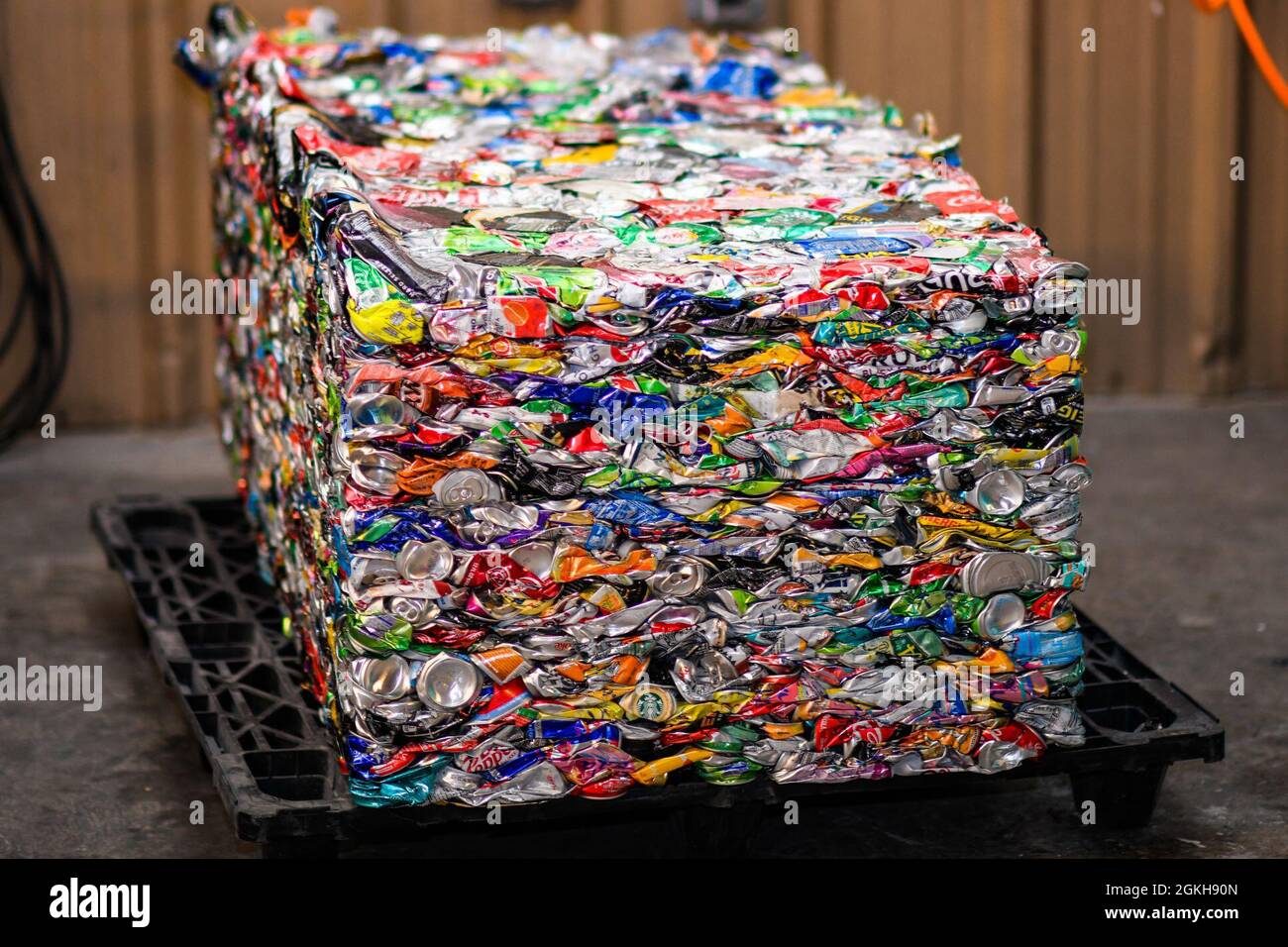 The recycling center, 27th Special Operations Wing, holds a cube of ...