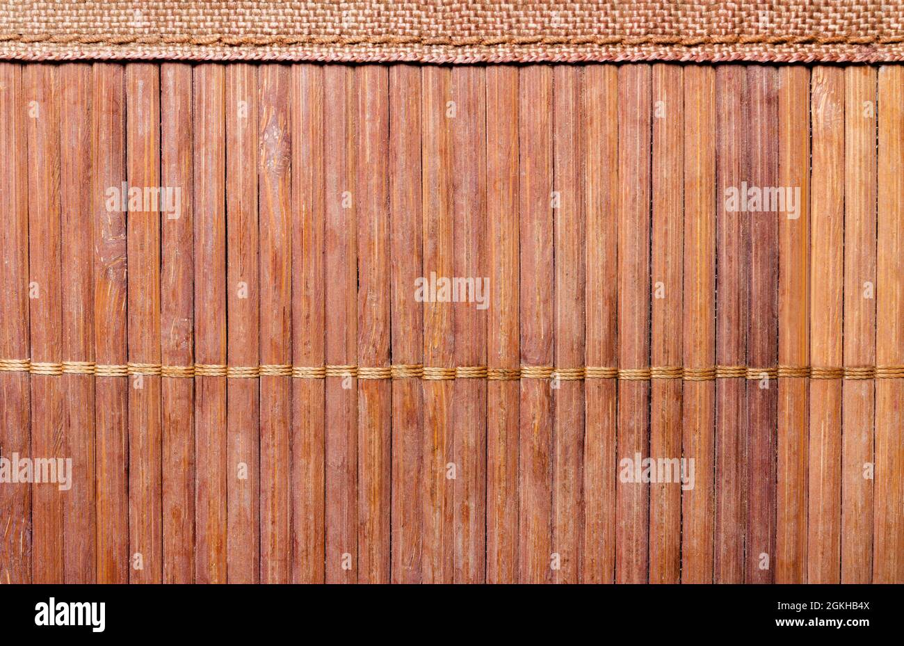 Texture backdrop photo of red colored bamboo mat sheet, front view ...