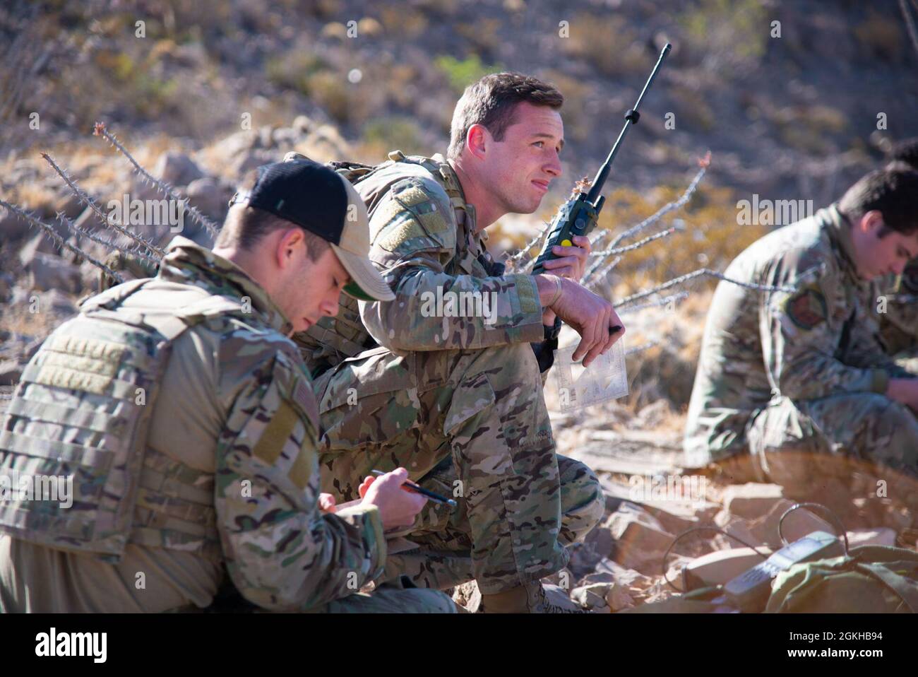 Two U.S. Air Force Tactical Air Control Party specialists communicate ...