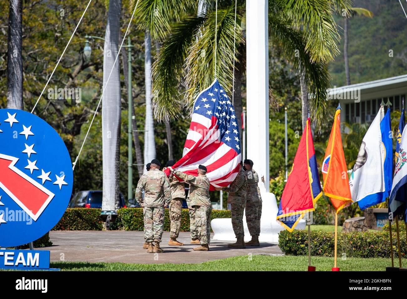 U.S. Army Pacific Soldiers prepare to fold the post flag April 22 ...