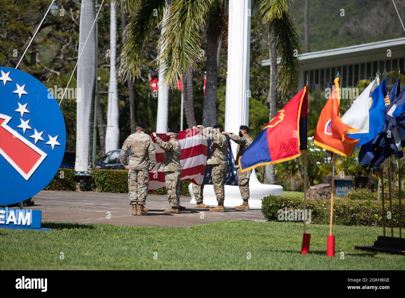 U.S. Army Pacific Soldiers fold the post flag April 22 during the ...