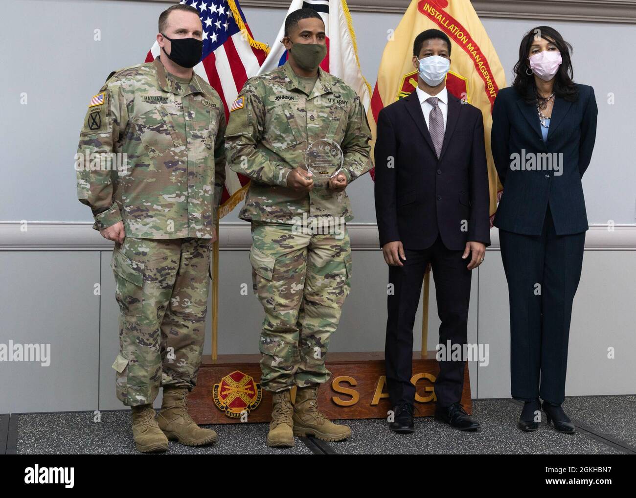 U.S. Army Staff Sgt. Elijah Johnson, HHB 2-10 BDE, receives the Overall ...